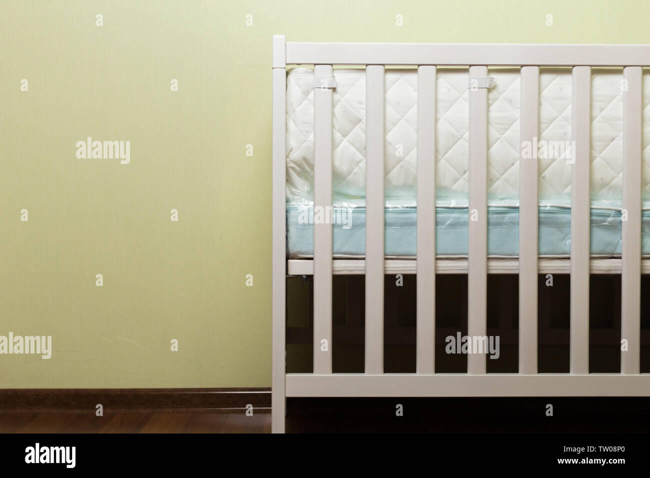 Empty wooden baby cot hi-res stock photography and images - Alamy