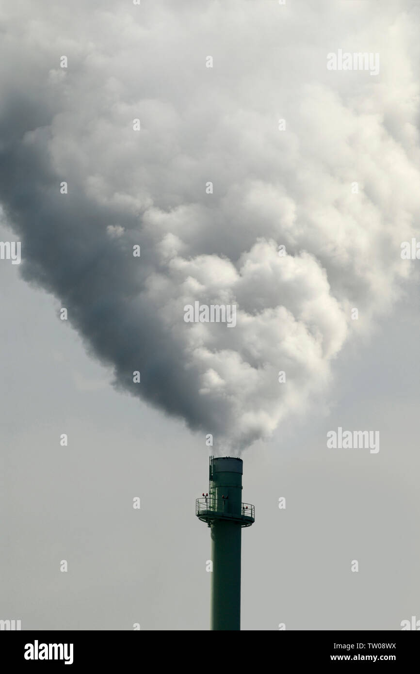 Smoke rising from a chimney, India Stock Photo - Alamy