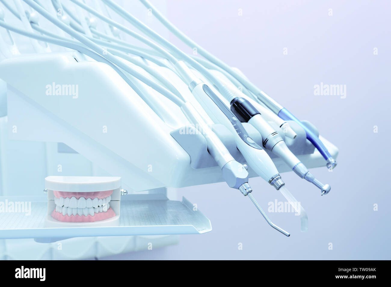 Dental jaw model and special instruments in modern clinic Stock Photo ...