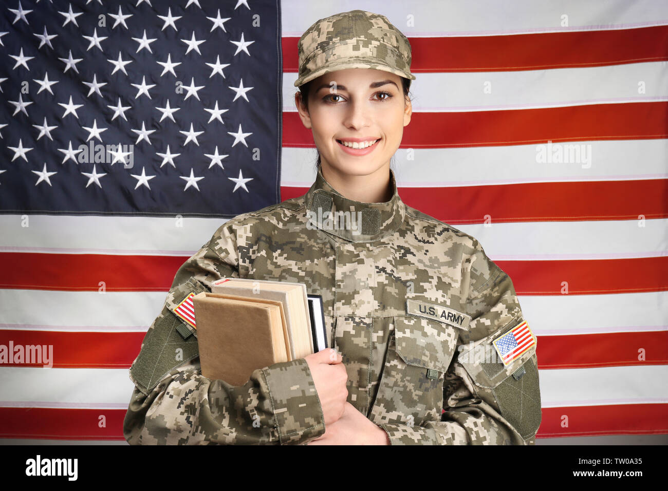 Female cadet of military school on flag background Stock Photo - Alamy