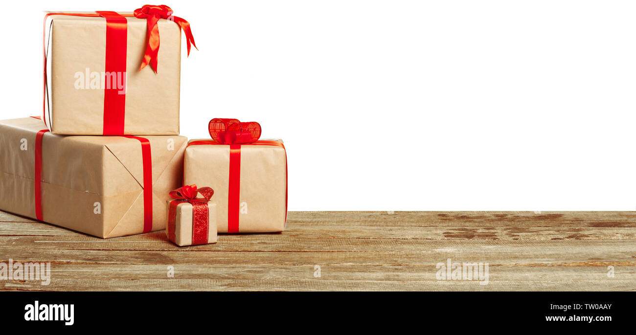 pile of gifts on the old table Stock Photo - Alamy