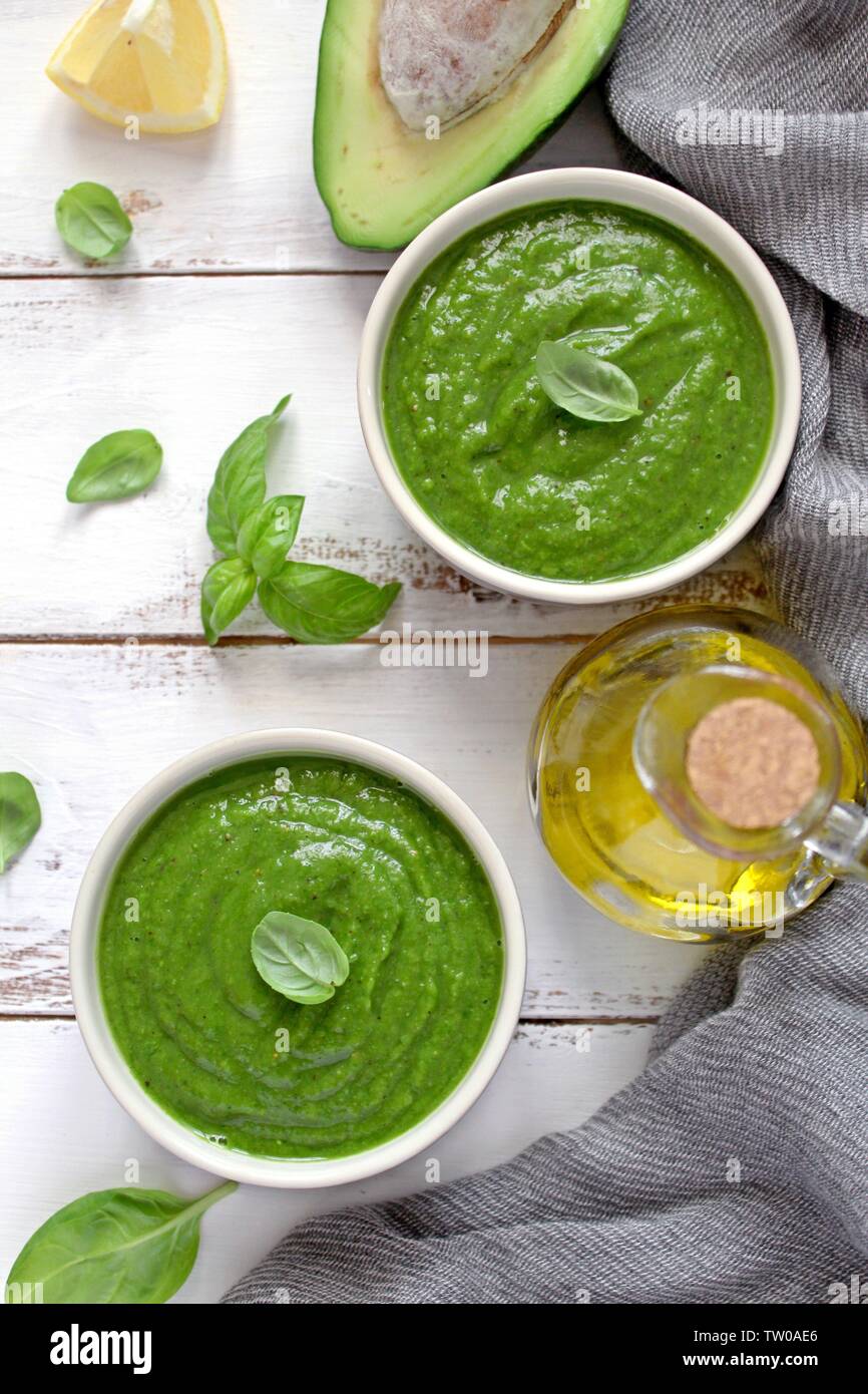Avocado smoothie with spinach. Top view with copy space. Diet food ...