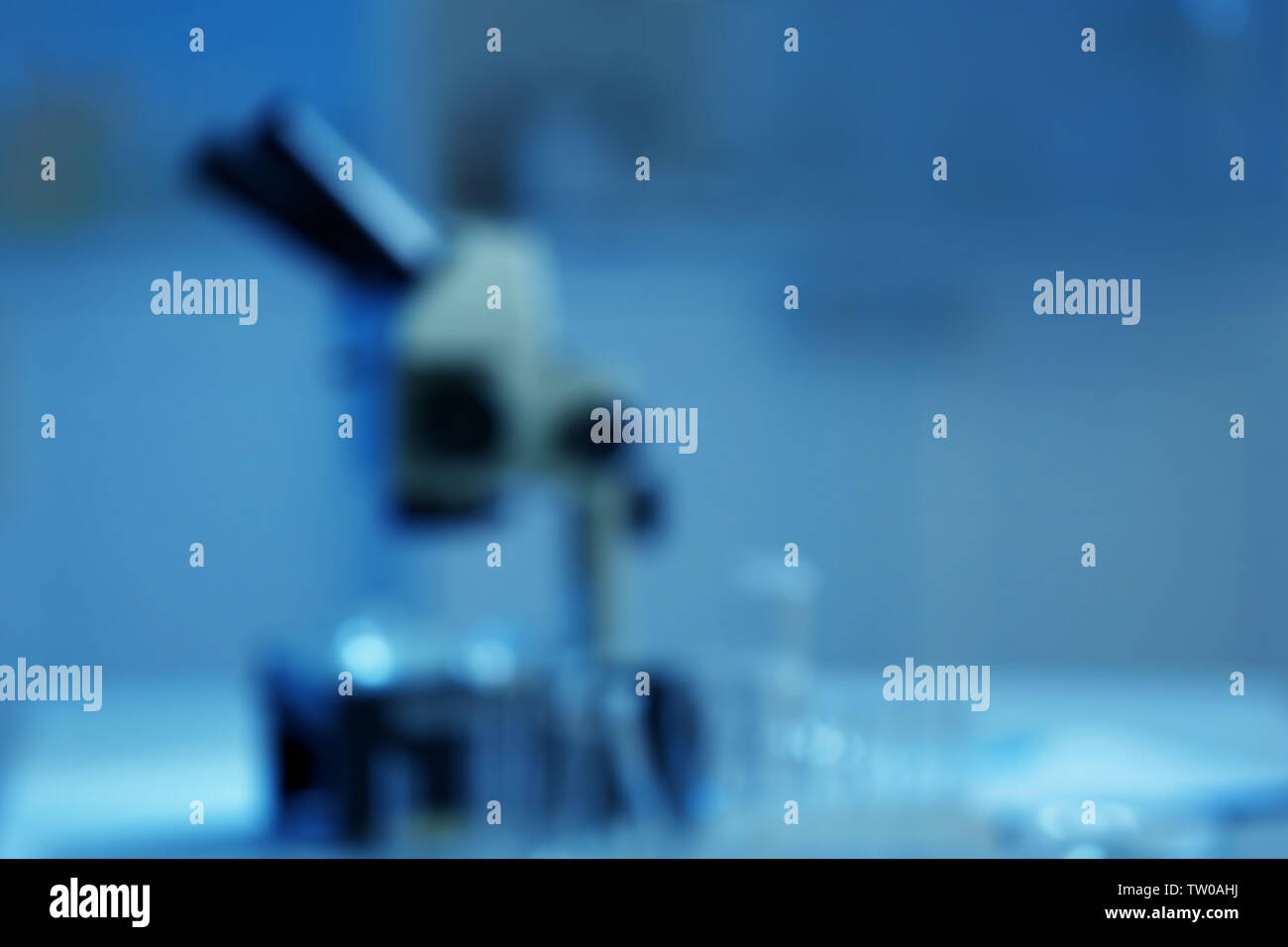 Blurred view of microscope in laboratory Stock Photo - Alamy
