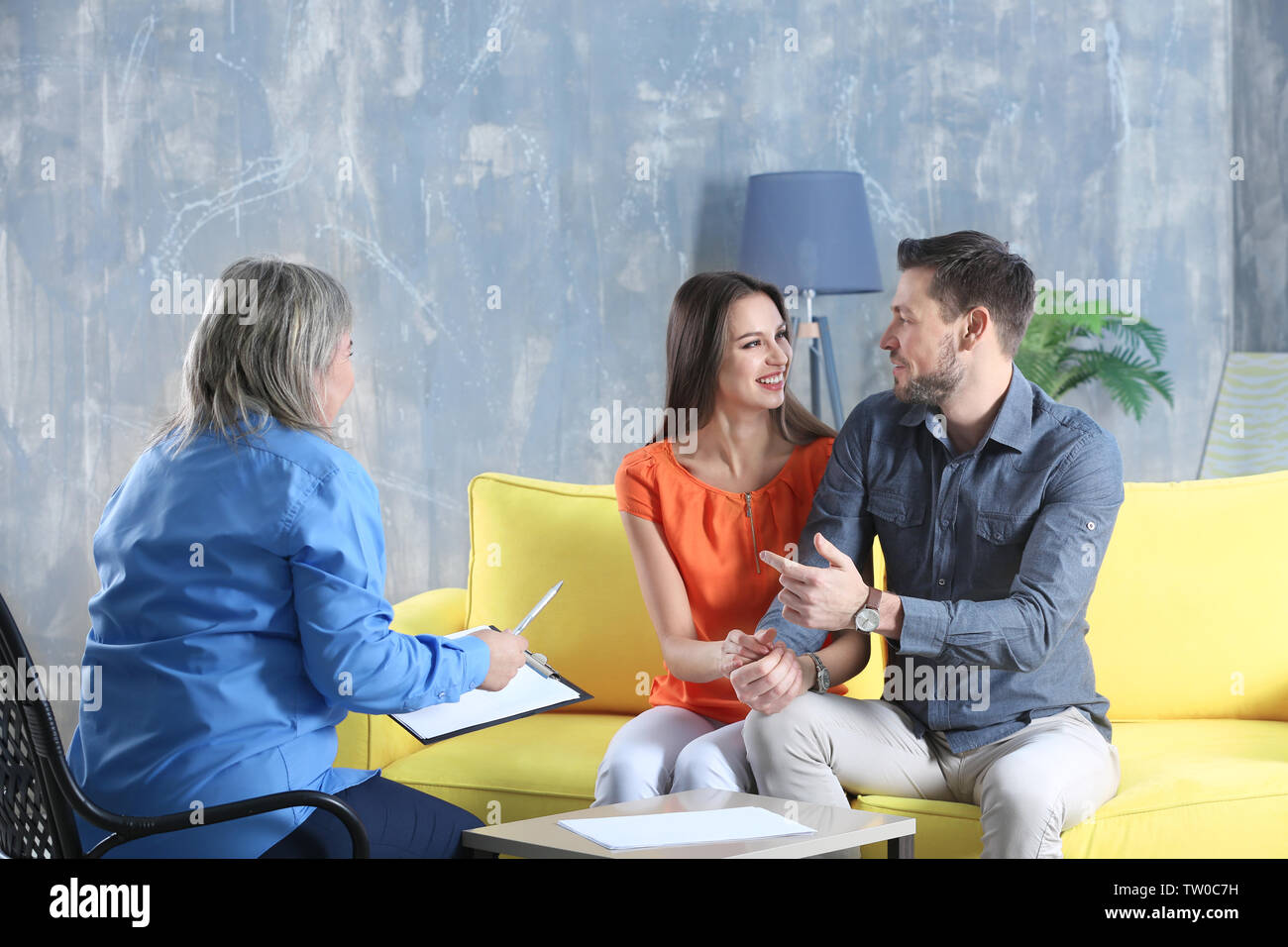 People talking at home Stock Photo - Alamy