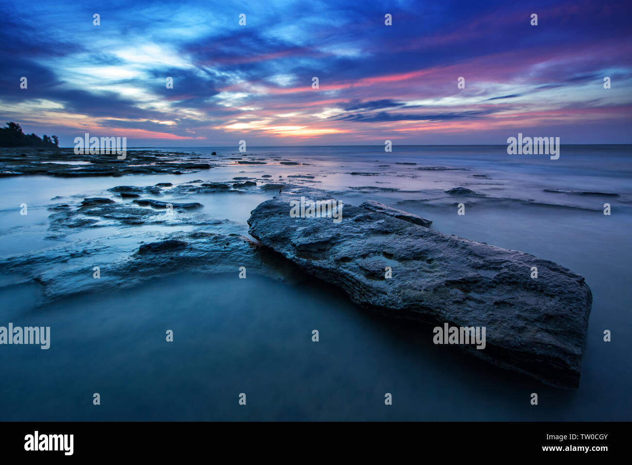 Colorful beach morning light Stock Photo - Alamy