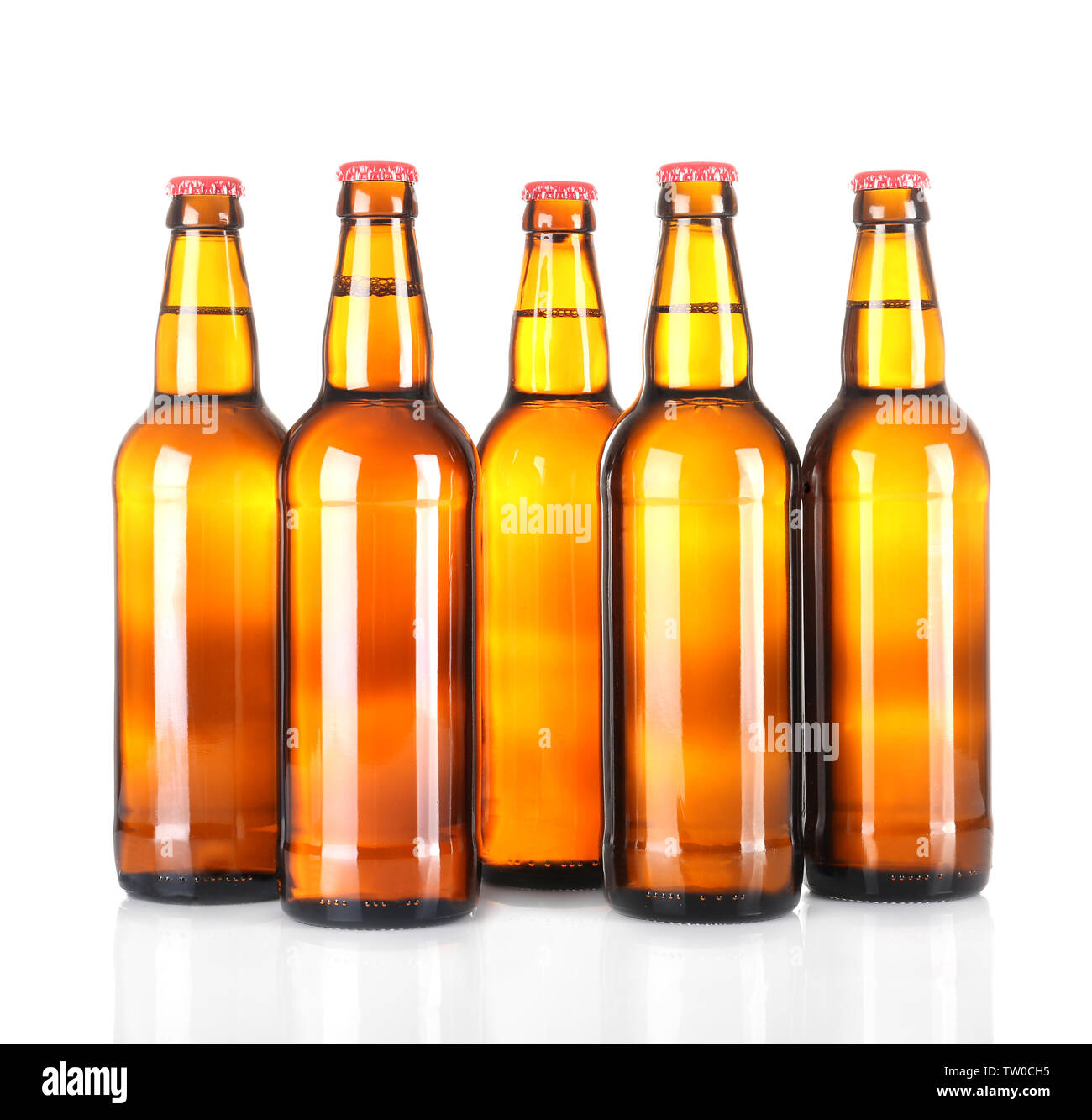 Beer bottles in a row isolated on white Stock Photo - Alamy