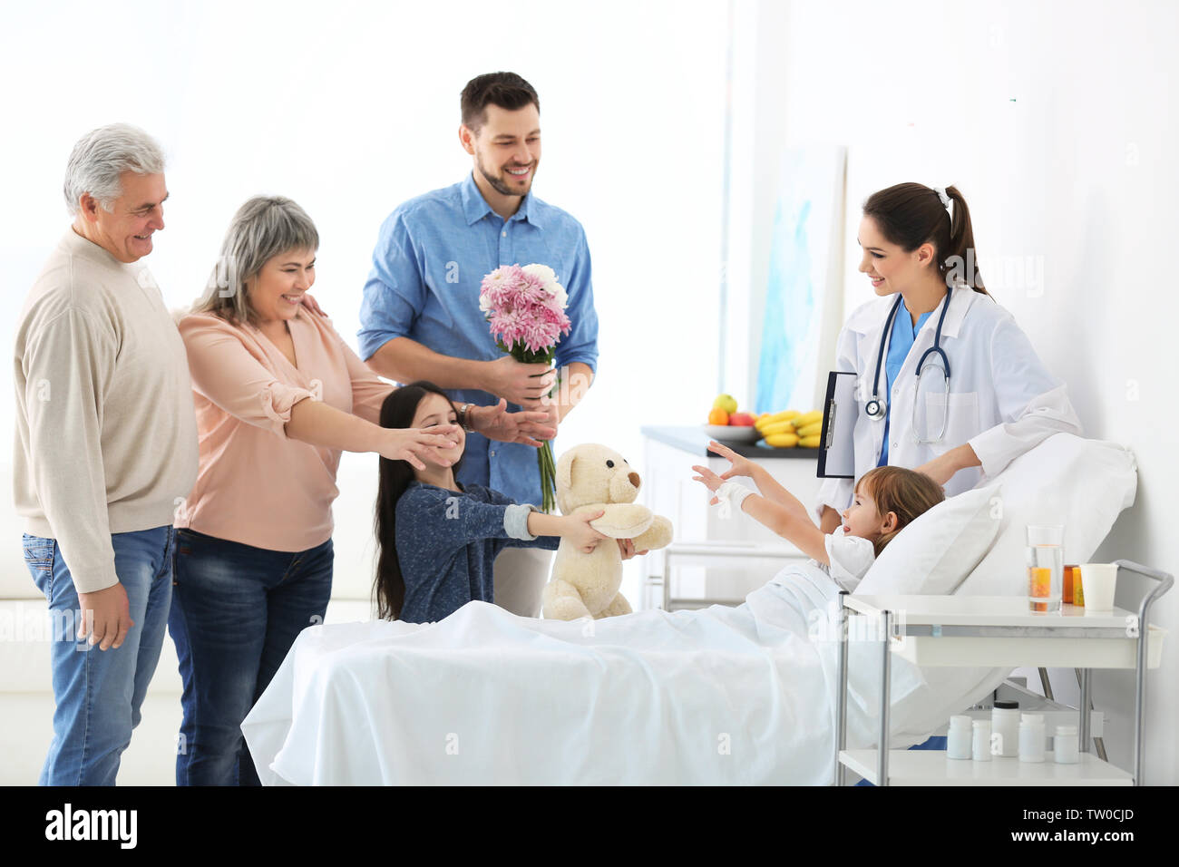 Parents visit sick child in hi-res stock photography and images - Alamy