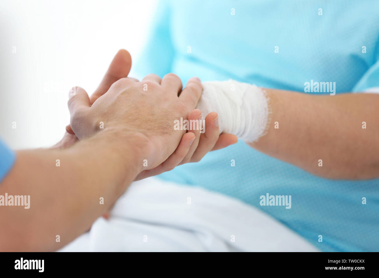 Doctor with senior patients family hi-res stock photography and images ...
