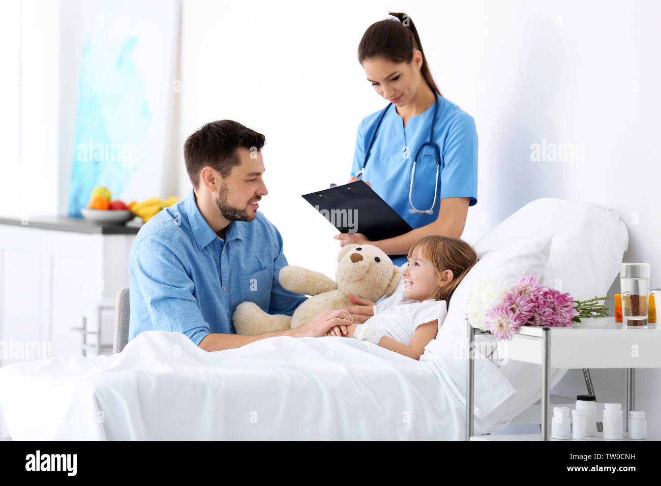 Father visiting little daughter in hospital Stock Photo - Alamy