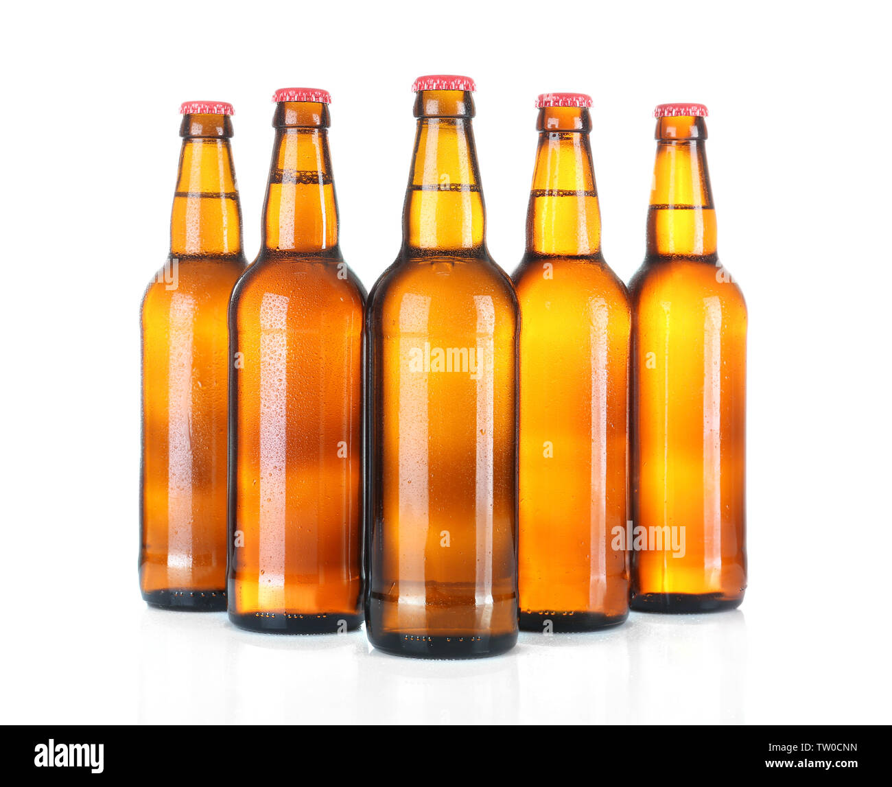 Beer bottles in a row isolated on white Stock Photo - Alamy