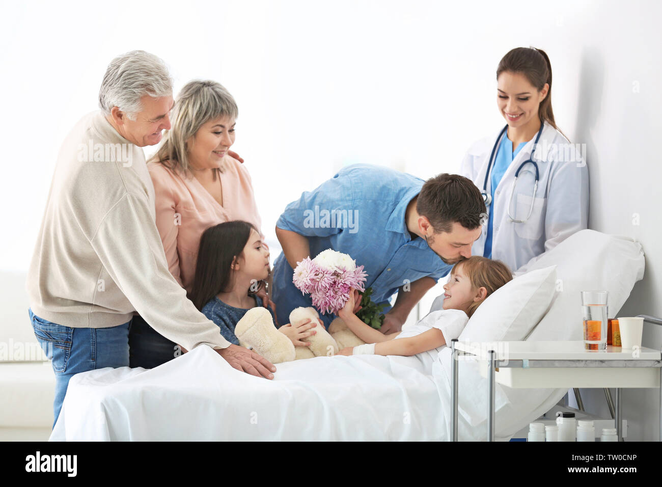 Parents visit sick child in hi-res stock photography and images - Alamy