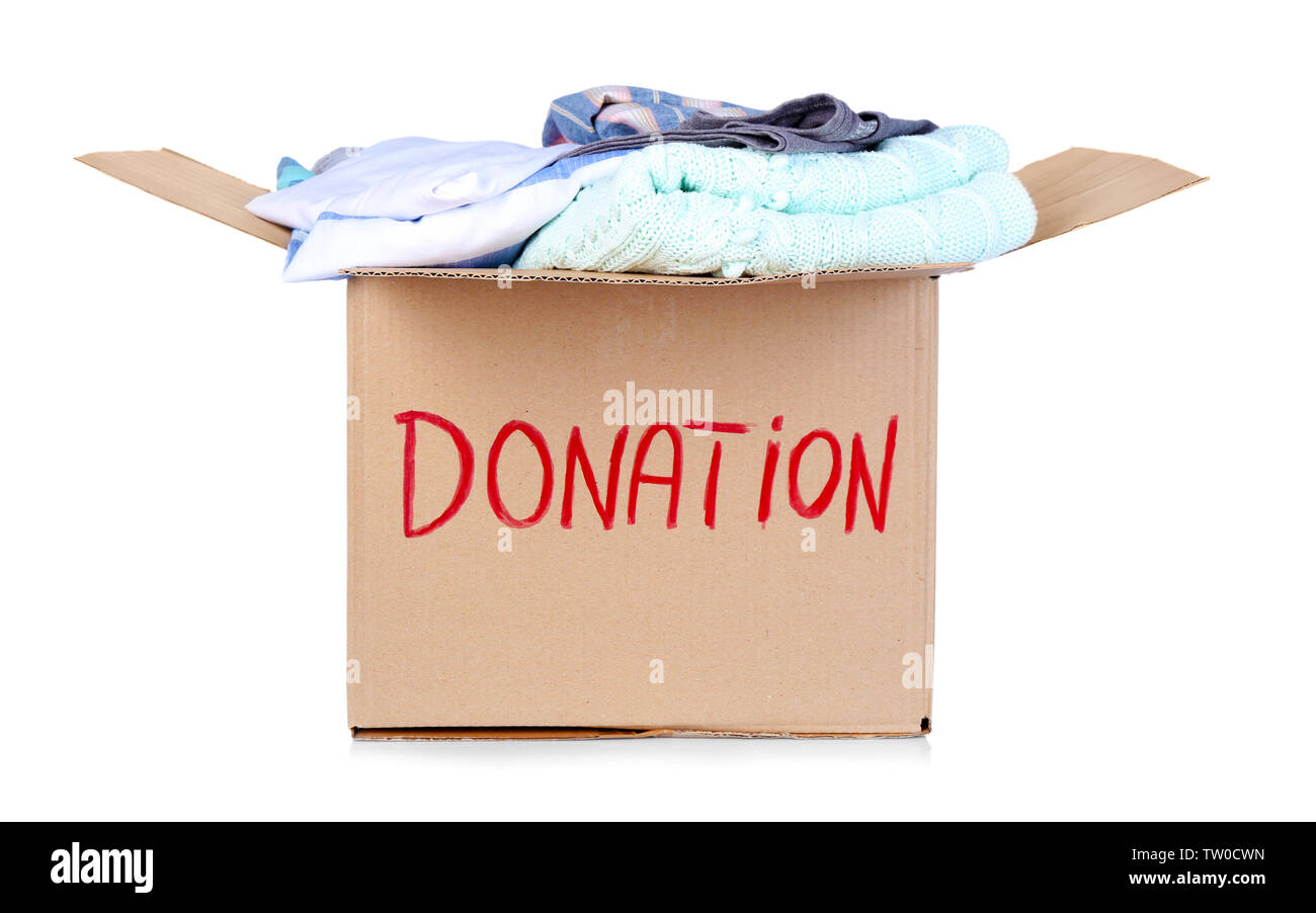 Donation box with clothes isolated on white Stock Photo - Alamy