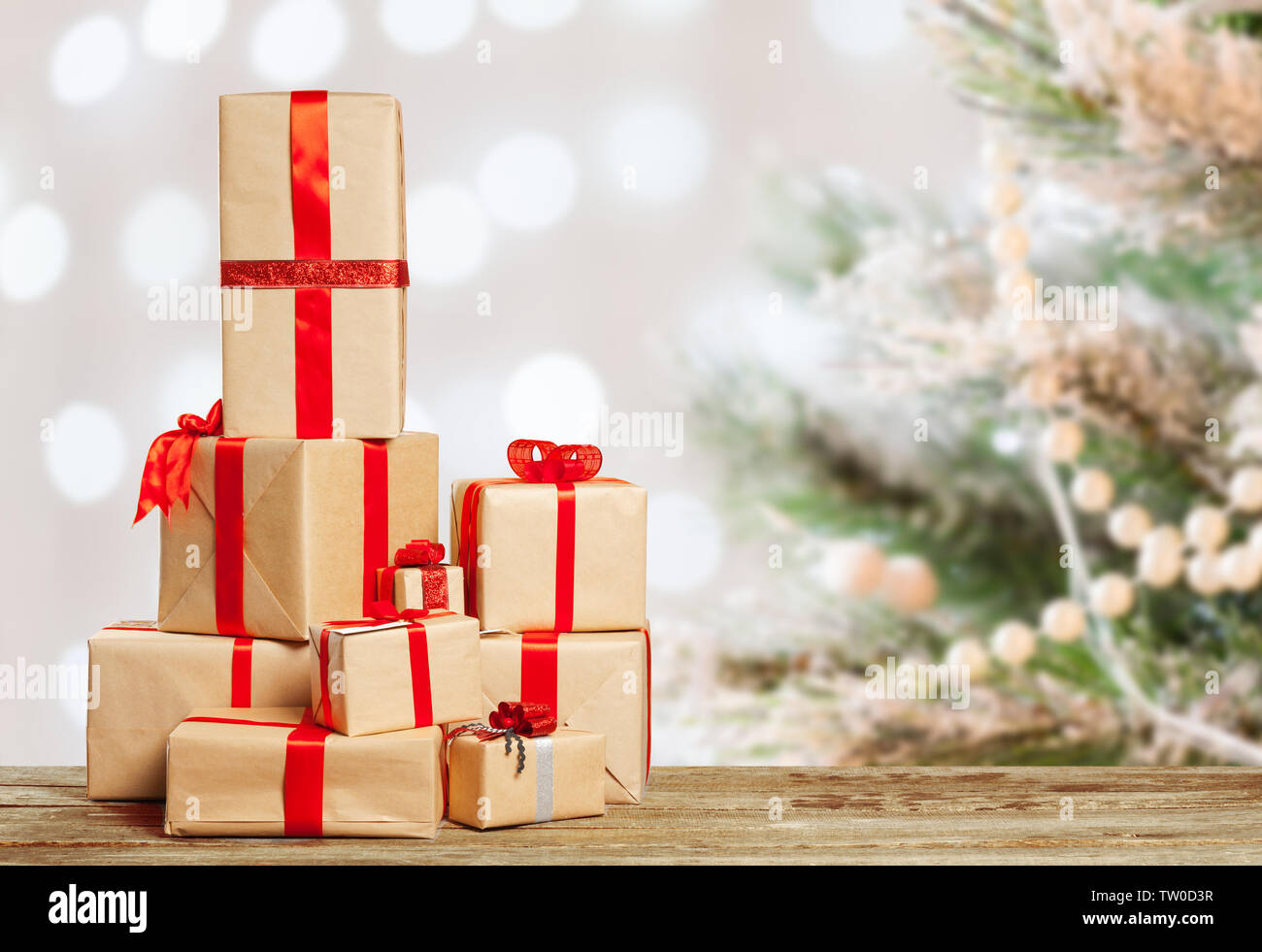 pile of gifts on the old table Stock Photo - Alamy