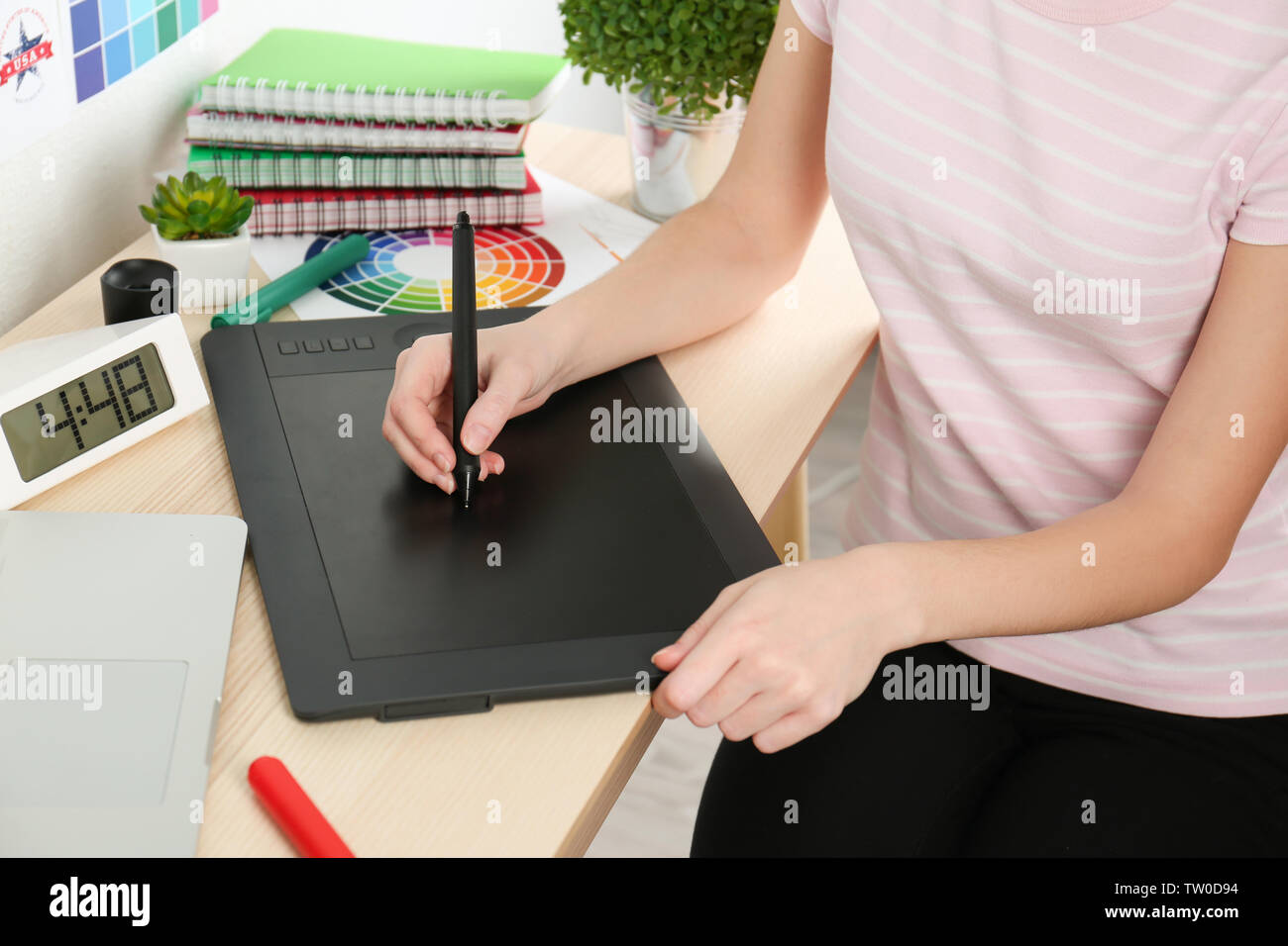 Young designer drawing sketches on graphic tablet Stock Photo - Alamy