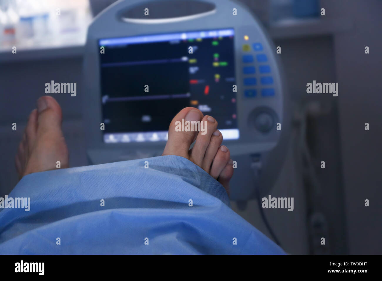 Feet of patient in operating room Stock Photo - Alamy