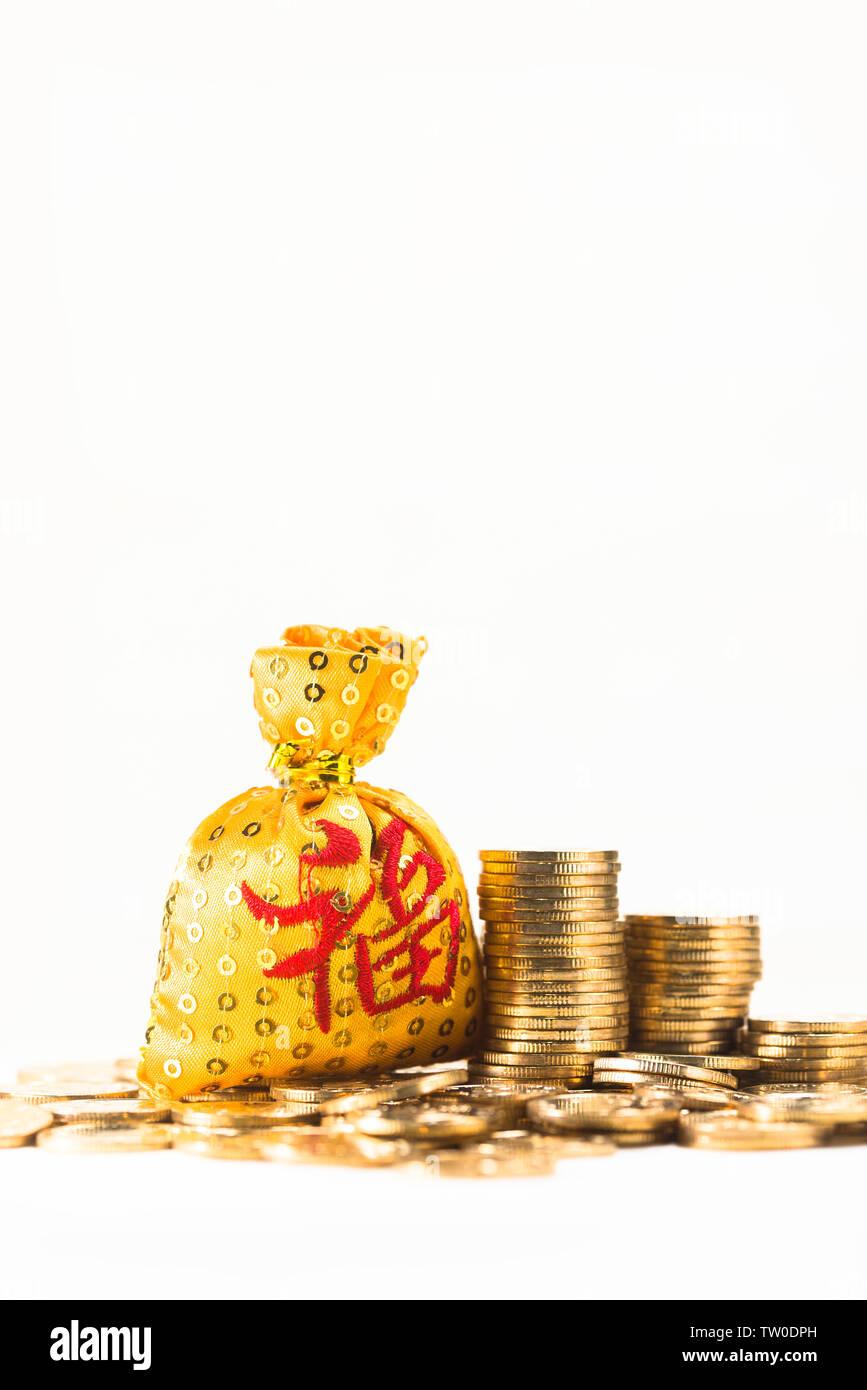 Fortune bag on white background with gold coin Stock Photo - Alamy