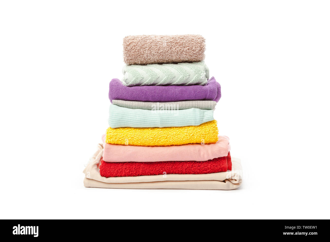 stack of clothing isolated on white Stock Photo - Alamy