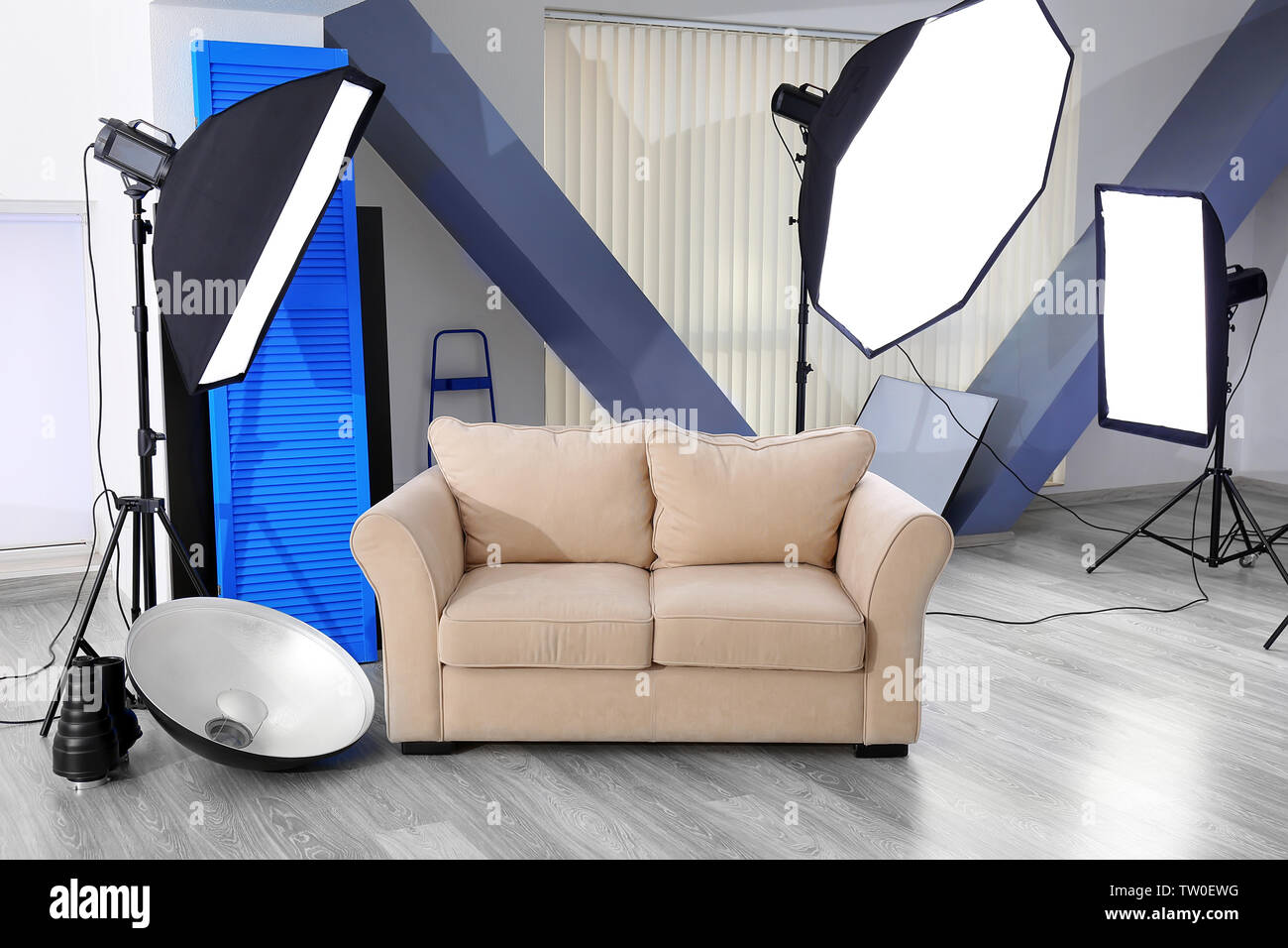 Photo studio with modern interior and lighting equipment Stock Photo ...