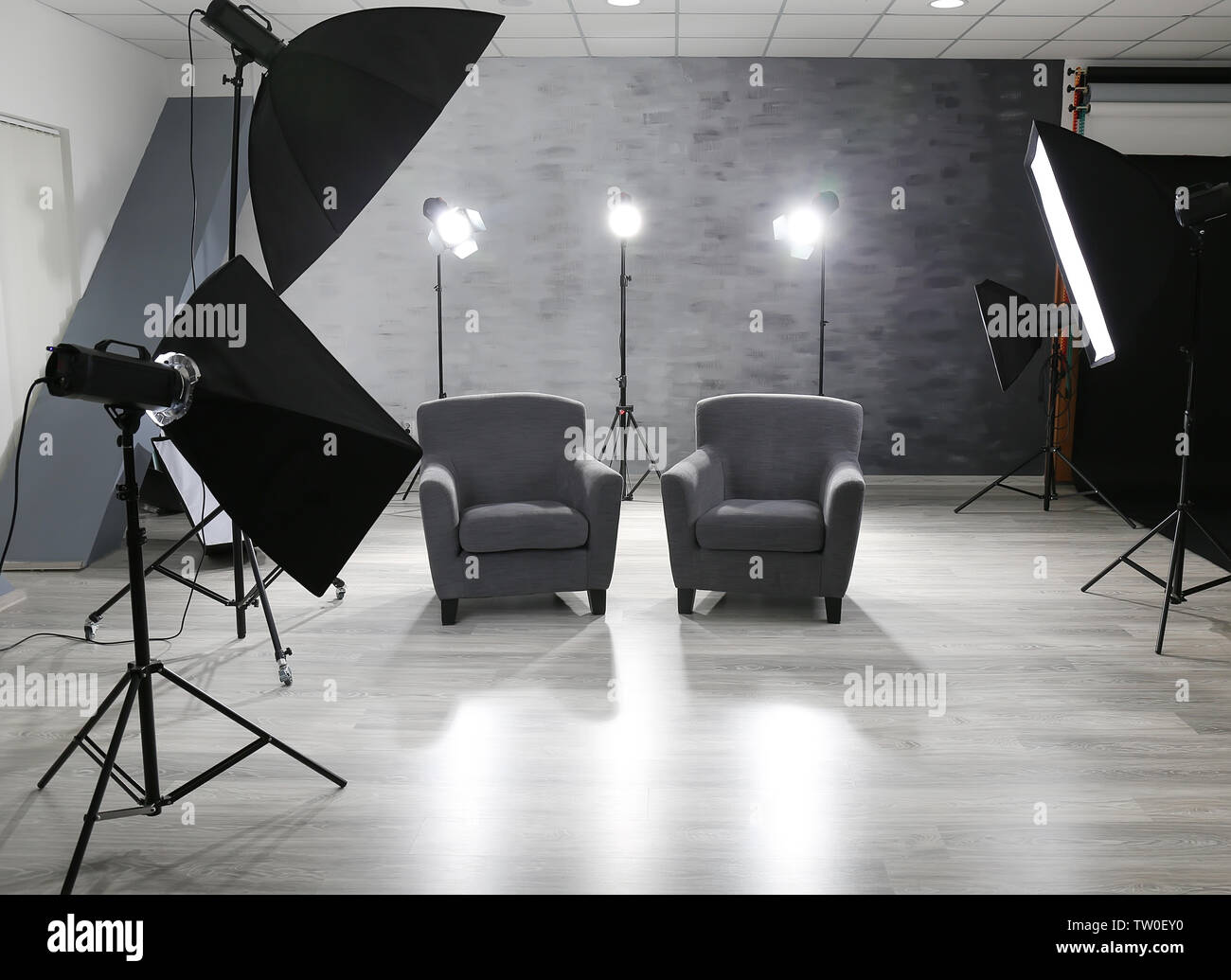Photo studio with modern interior and lighting equipment Stock Photo ...