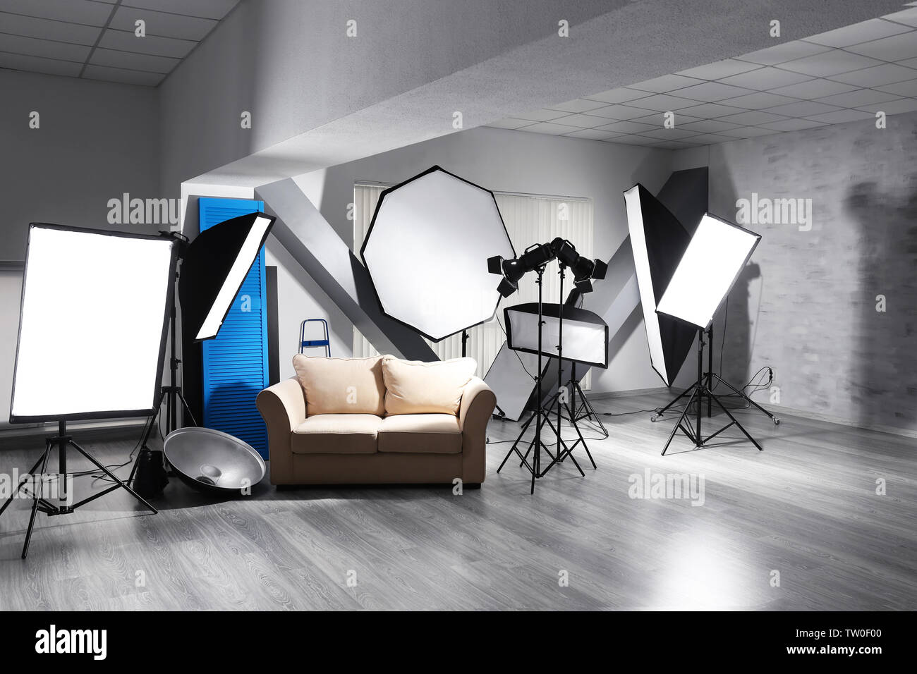 Photo studio with modern interior and lighting equipment Stock Photo ...