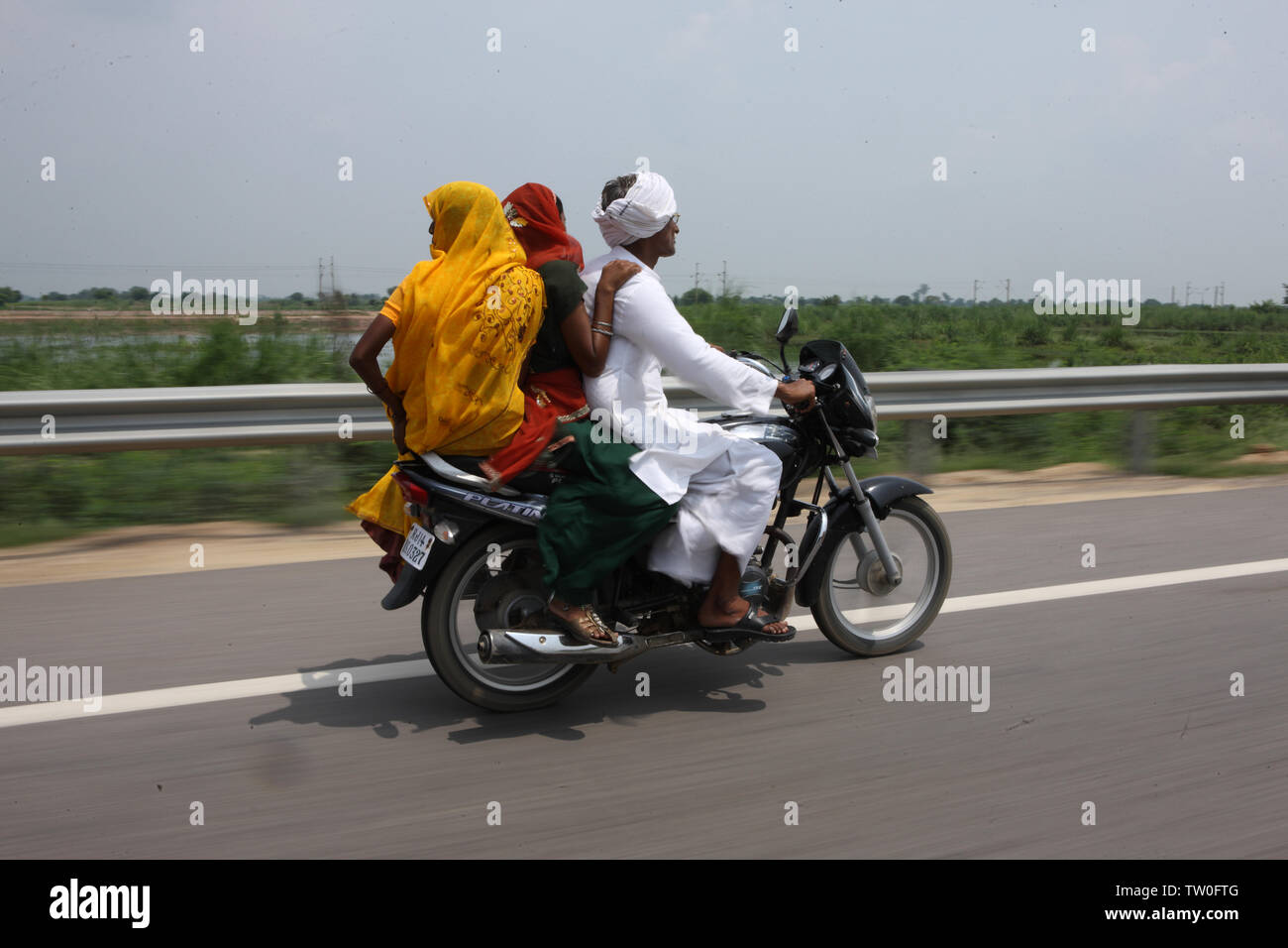 Motorcycle on the road, India Stock Photo - Alamy