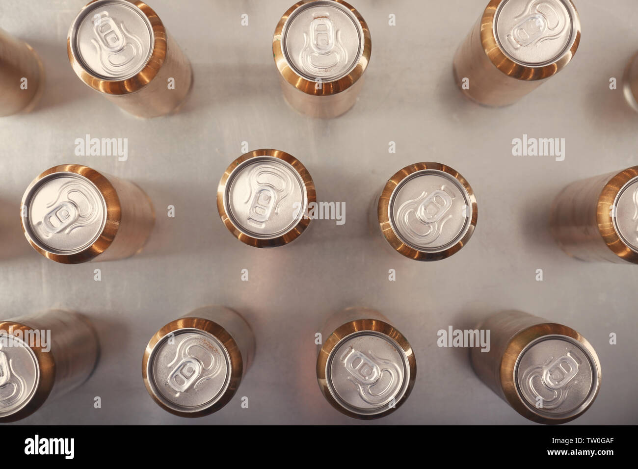 Cans of beer on gray table, top view Stock Photo - Alamy