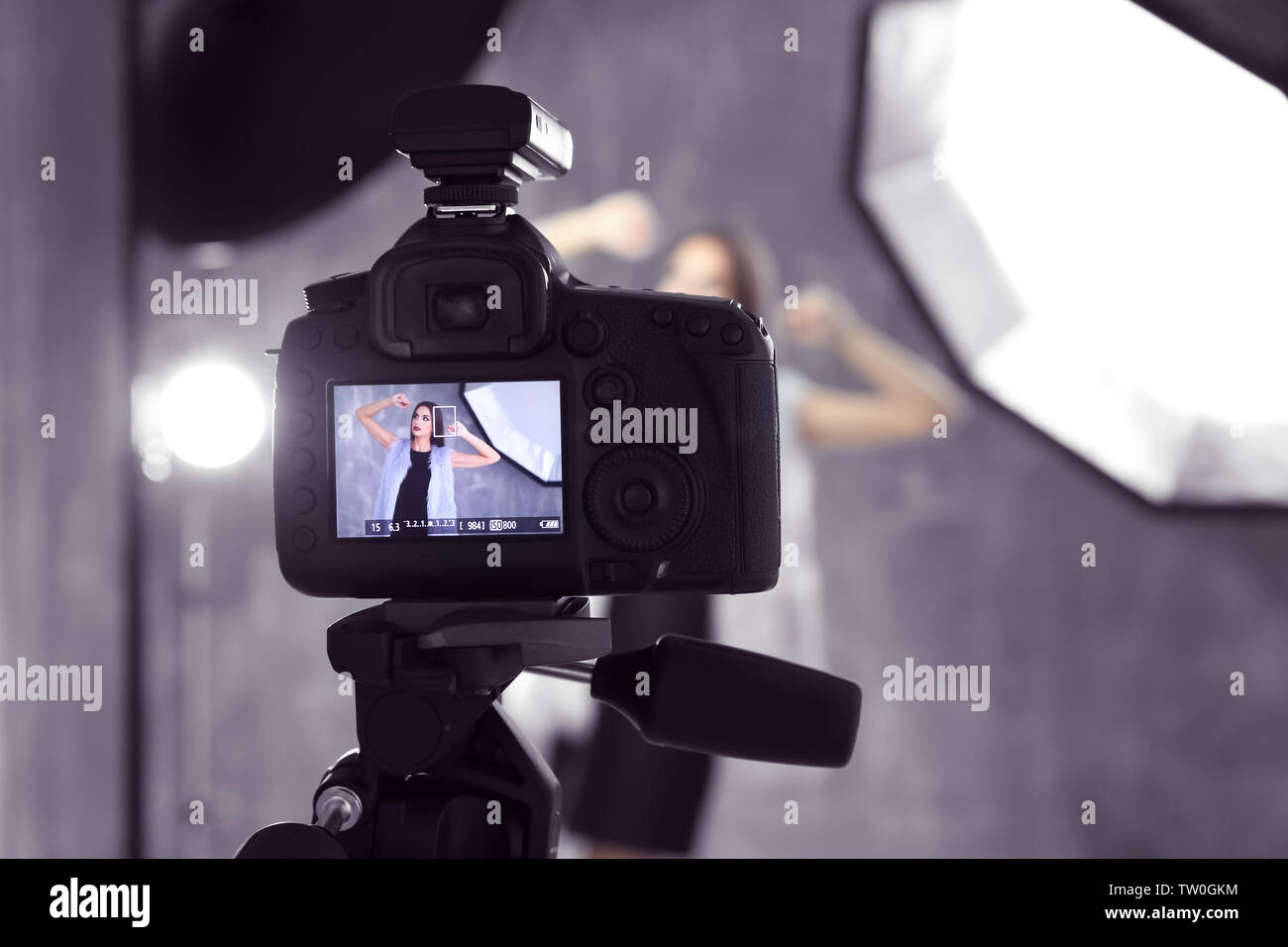 Picture of young beautiful model on camera display while shooting Stock ...
