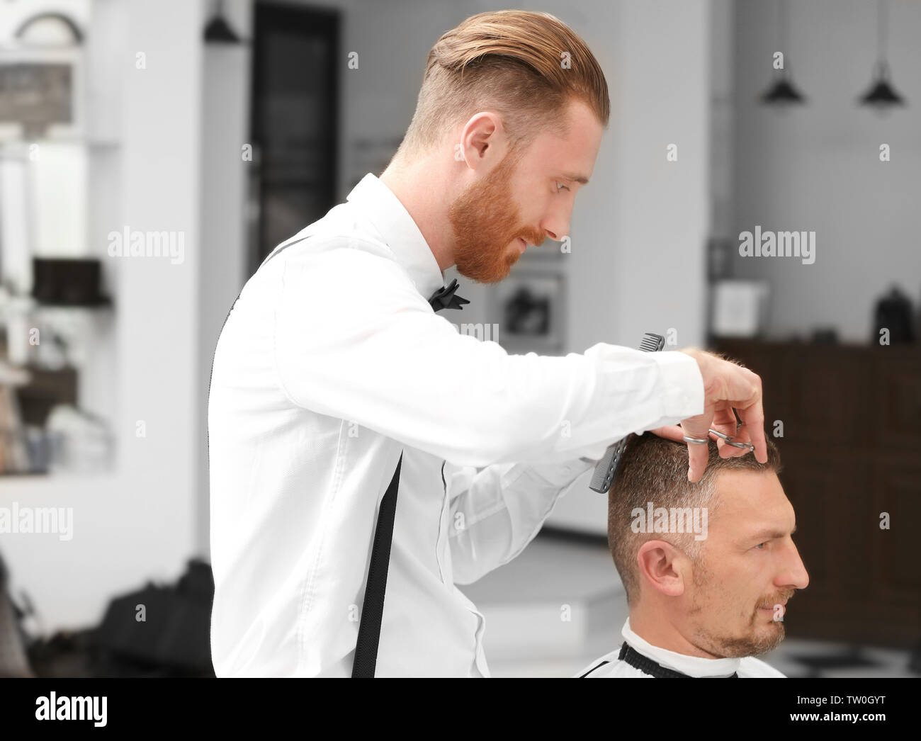 Hipster male client visiting modern hi-res stock photography and images ...