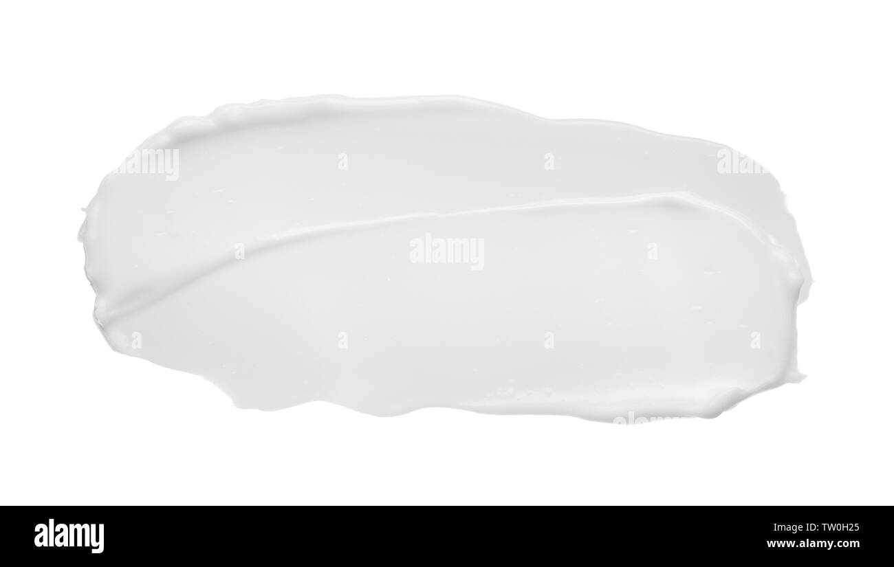 Smears and texture of face cream or white acrylic paint isolated on ...