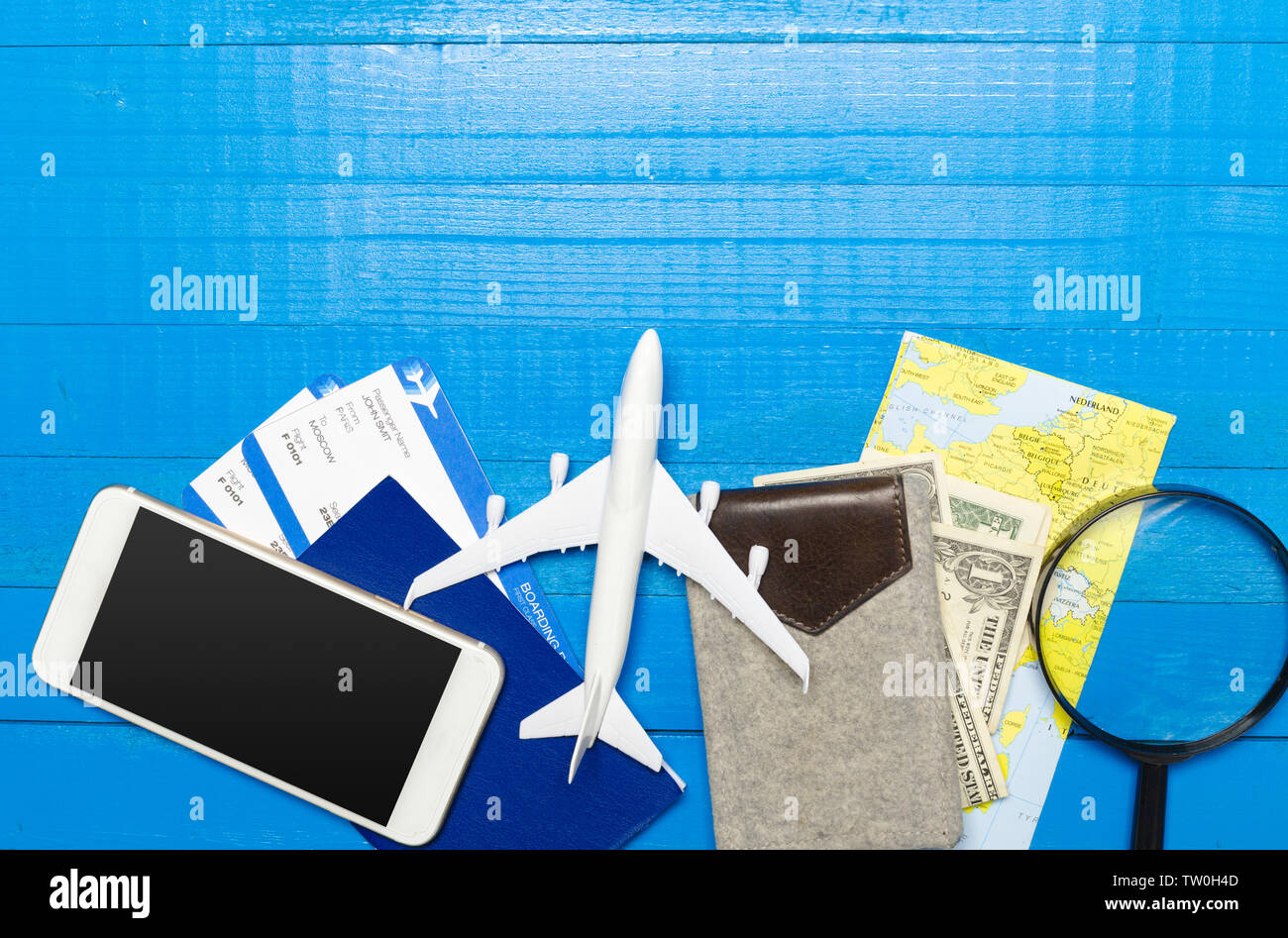Travel objects on wooden background Stock Photo - Alamy