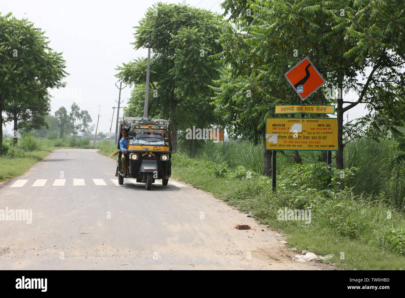 Auto rickshaw on the road Stock Photo - Alamy
