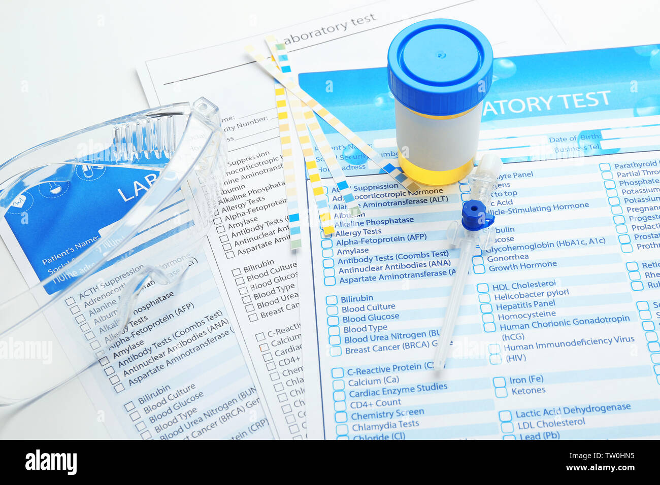 Items for laboratory analysis on test forms Stock Photo - Alamy