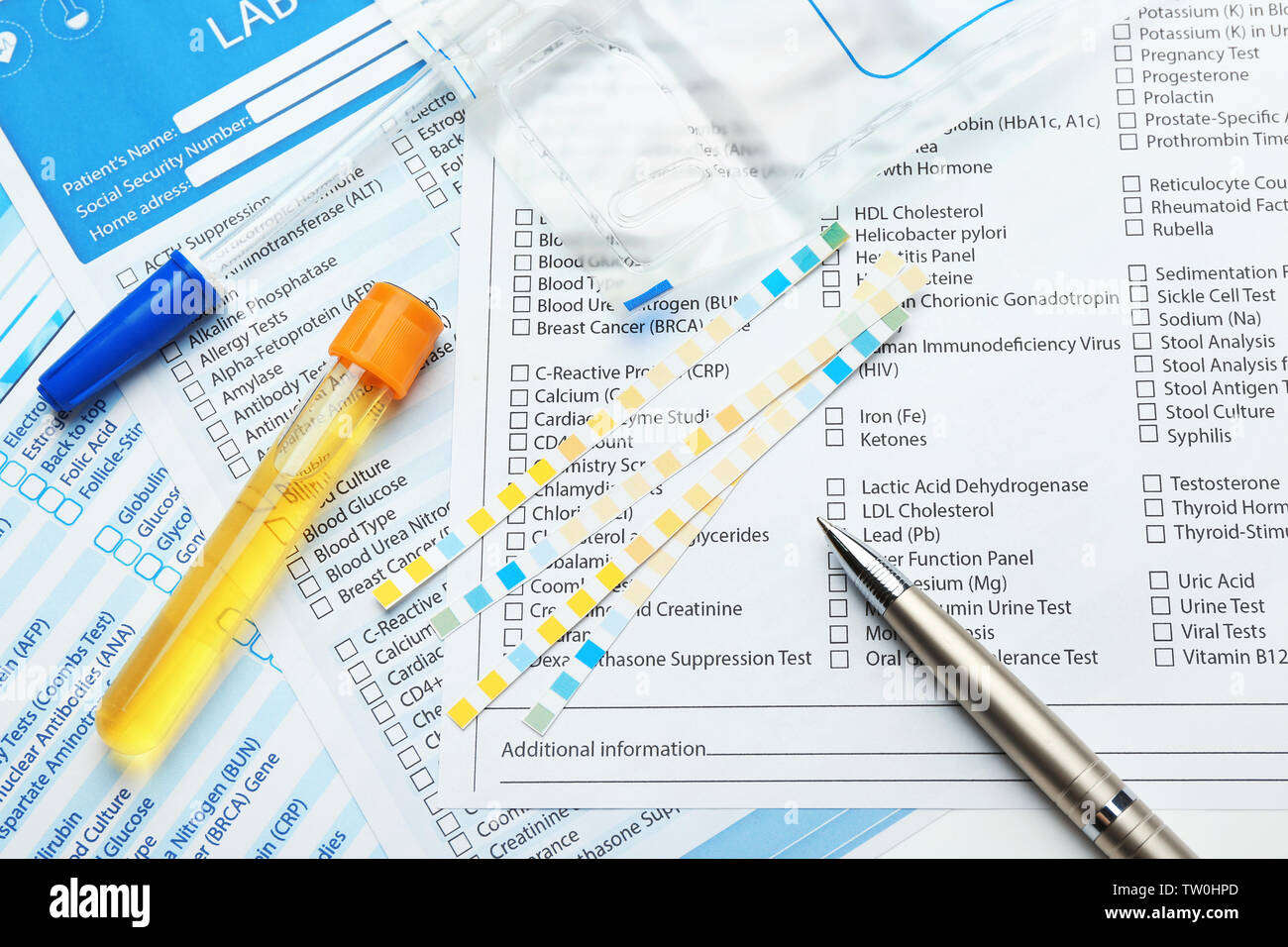 Items for laboratory analysis on test forms Stock Photo - Alamy