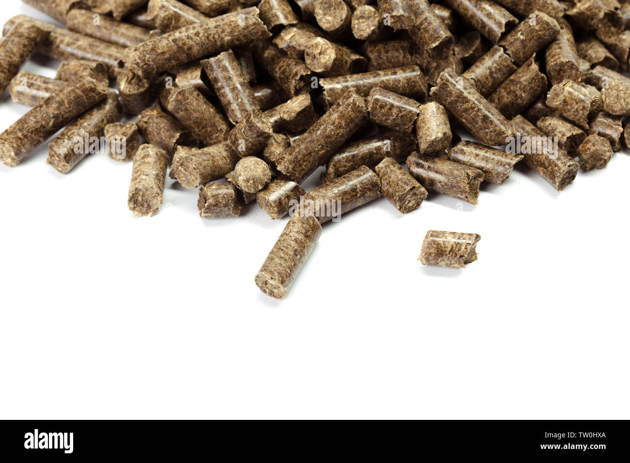 stack of wooden pellets for bio energy, white background, isolated ...