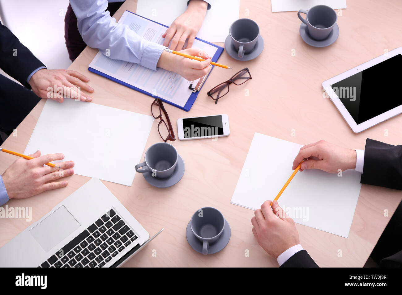 Job interview at table in modern office Stock Photo - Alamy