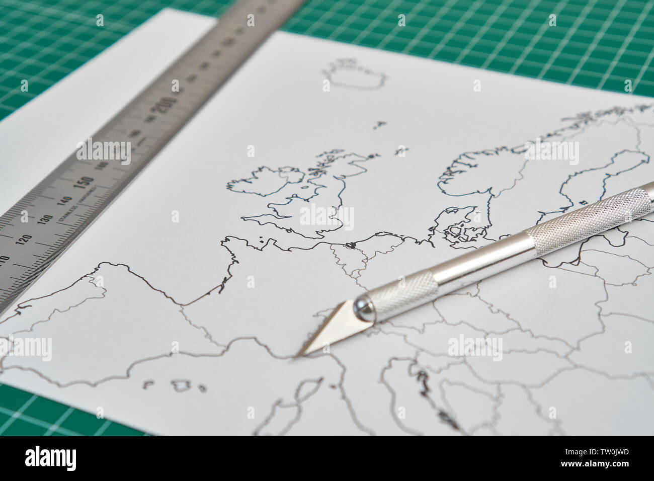 europe map with a ruler and a cutter ready to be divided Stock Photo ...