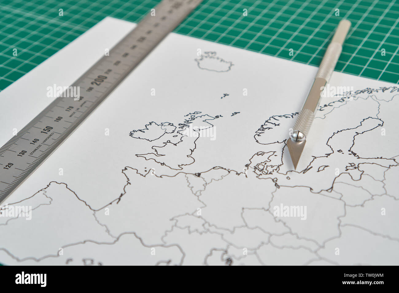 europe map with a ruler and a cutter ready to be divided Stock Photo ...