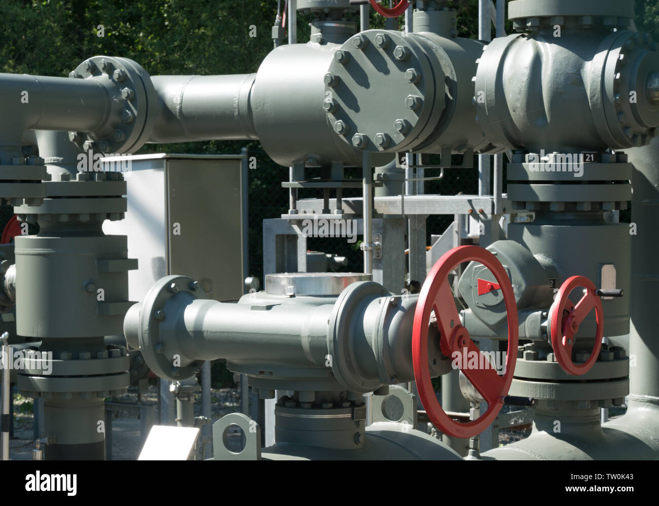 close up view of the pipe system in a water and sewage treatment plant ...