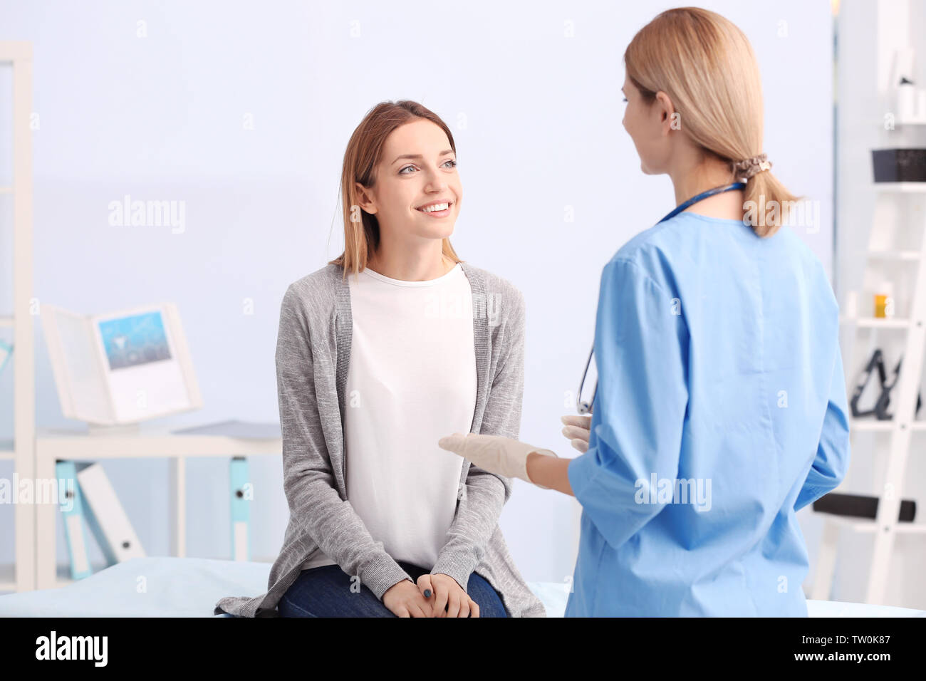 Young woman and doctors bed hi-res stock photography and images - Alamy
