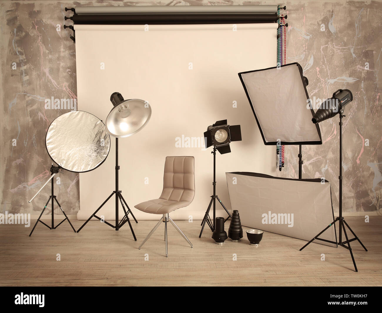 Modern photo studio with lighting equipment Stock Photo - Alamy
