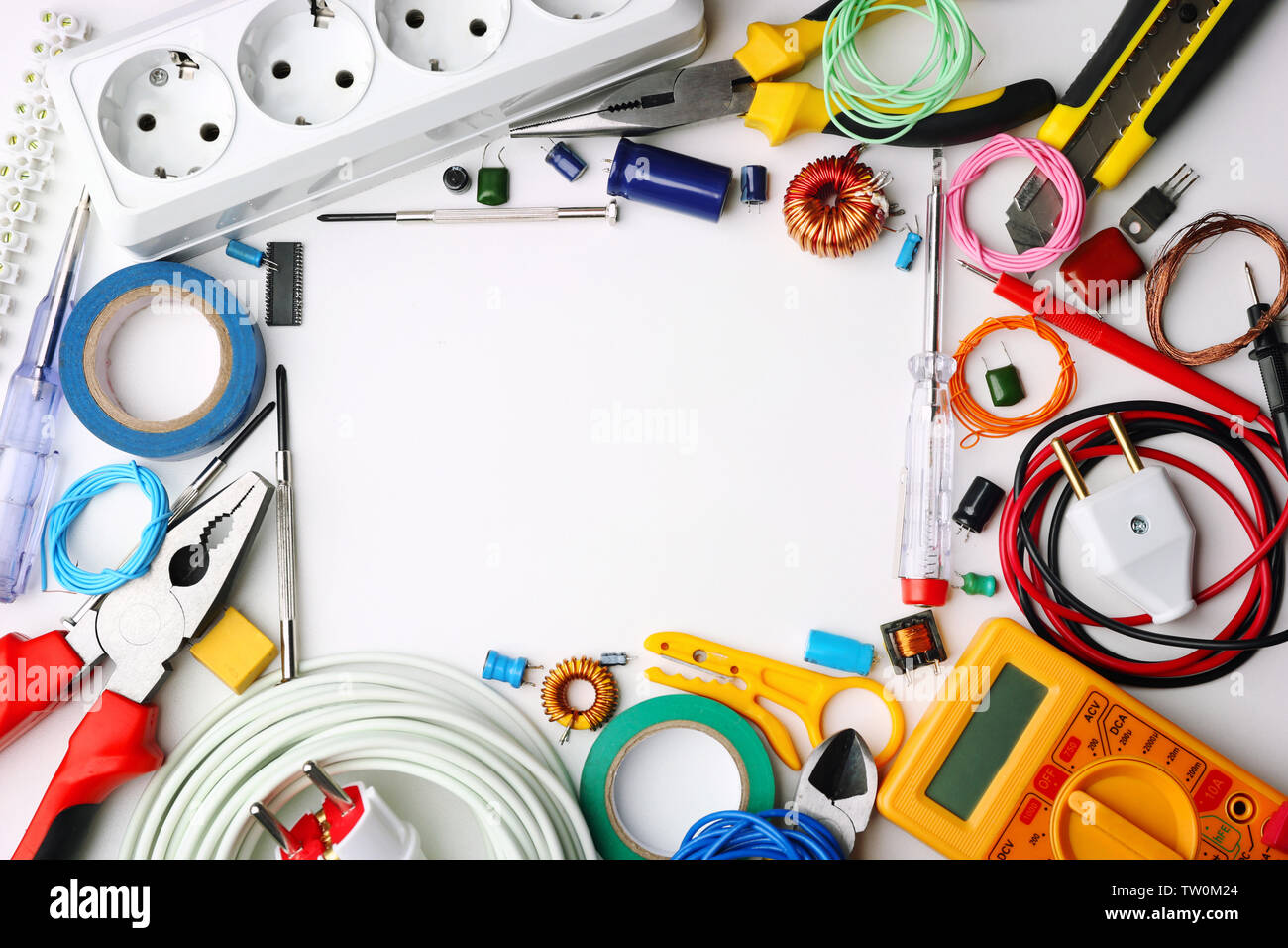 Different electrical tools on white table, top view Stock Photo - Alamy