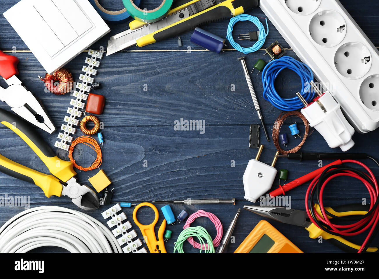 Different electrical tools on wooden table, top view Stock Photo - Alamy