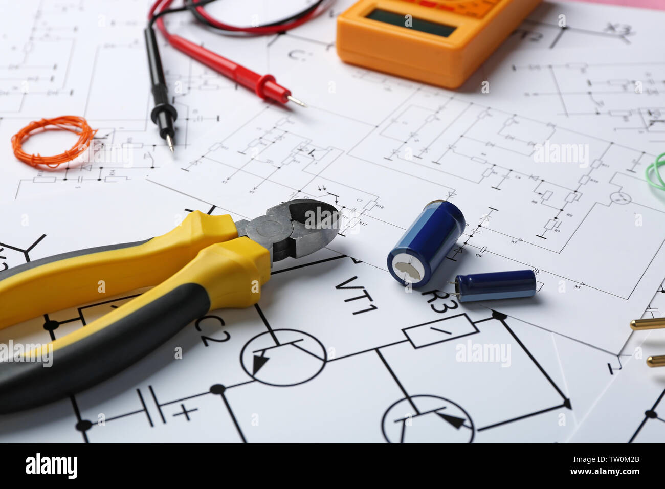 Different electrical tools on paper circuit drawing background Stock ...