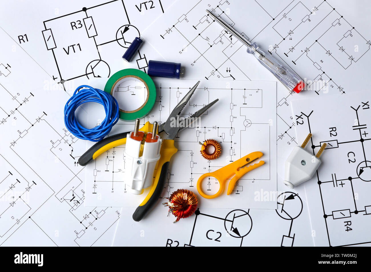 Different electrical tools on paper circuit drawing background Stock ...