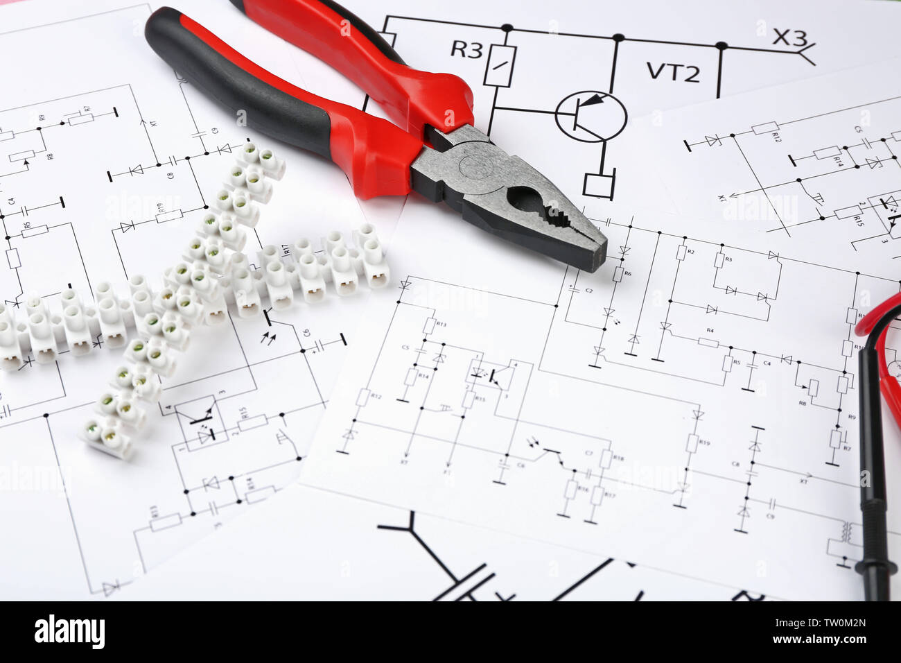 Different electrical tools on paper circuit drawing background Stock ...