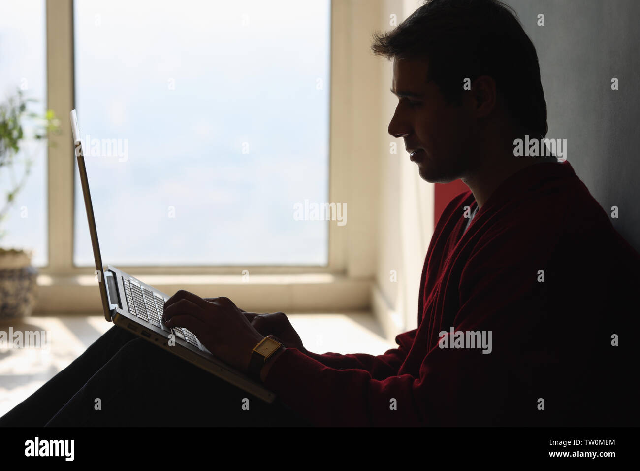 Man computer silhouette home hi-res stock photography and images - Alamy