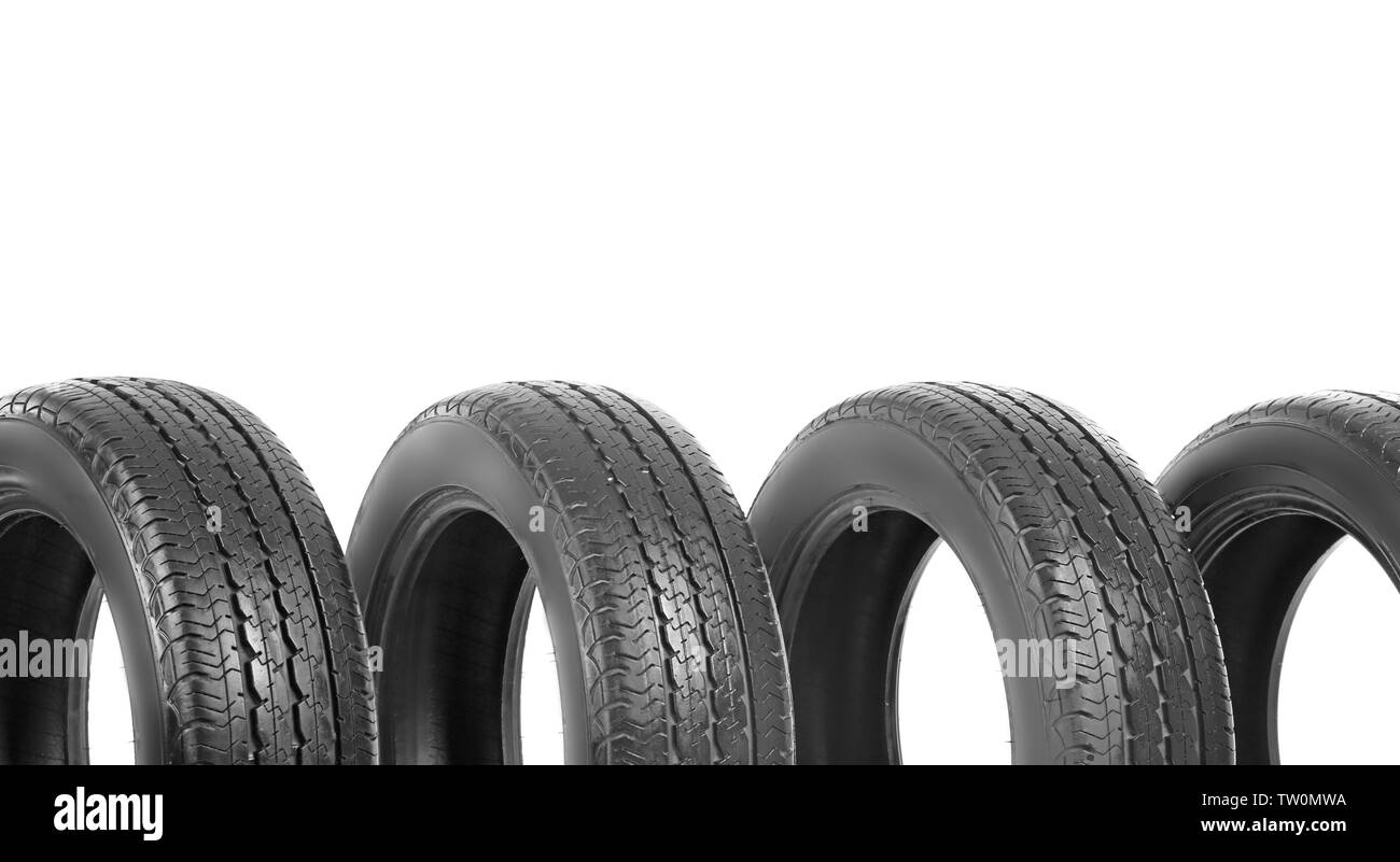 Car tires, isolated on white Stock Photo - Alamy