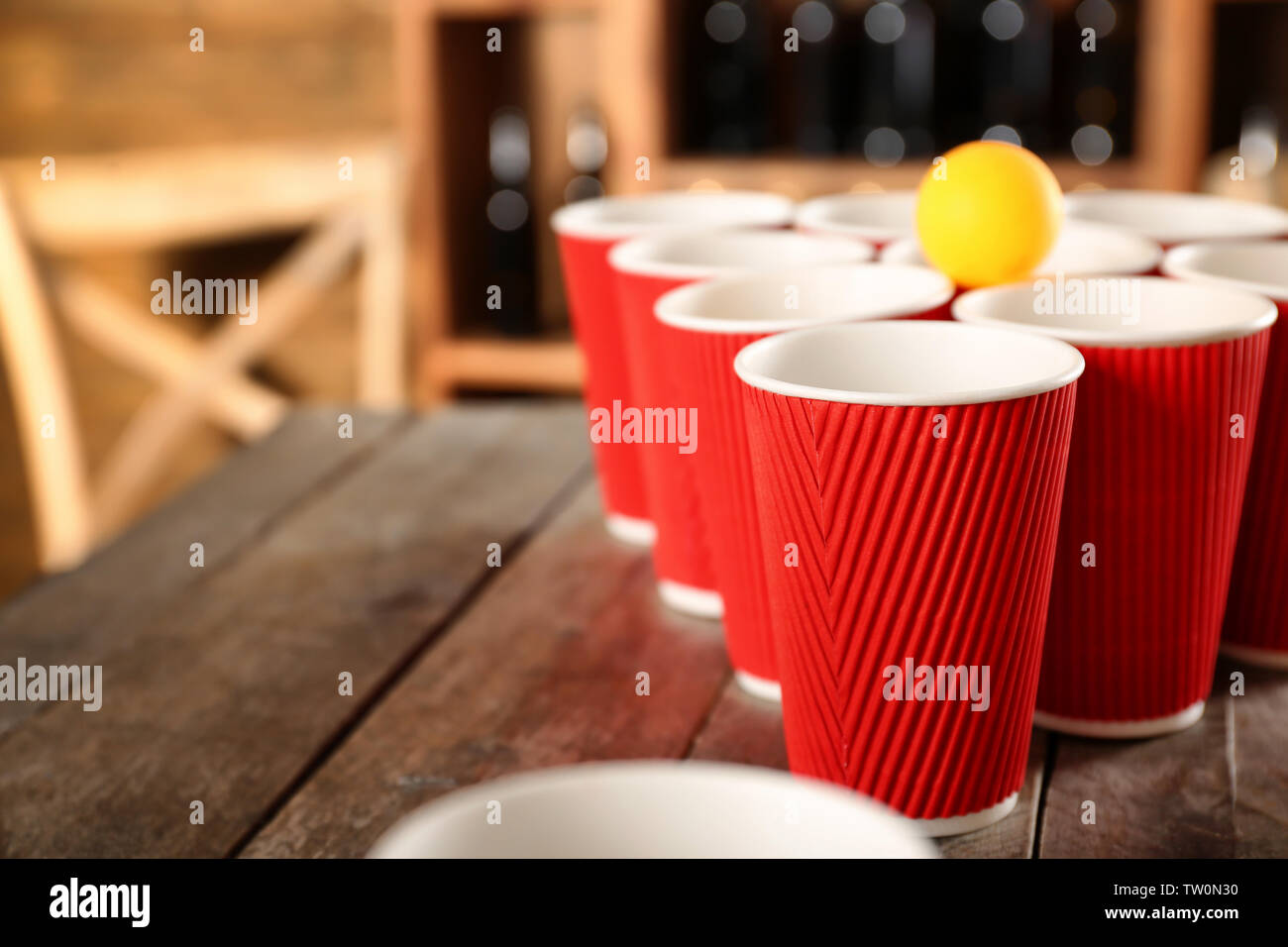 Plastic beer pong cups and ball, closeup Stock Photo - Alamy