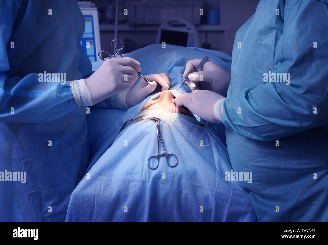 Operating of patient in modern hospital Stock Photo - Alamy