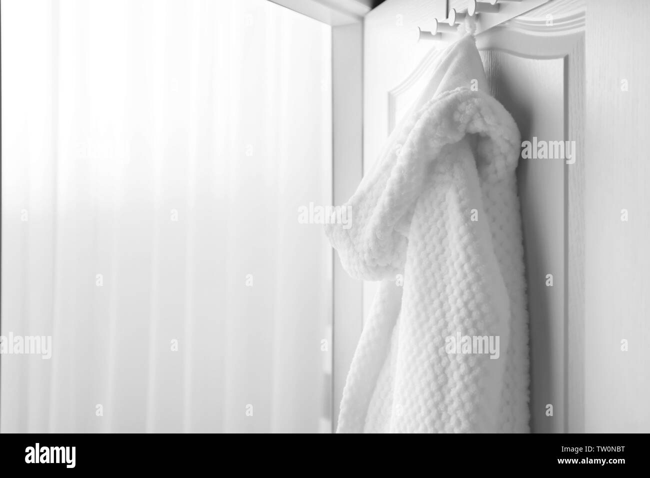 Hanging robe Black and White Stock Photos & Images - Alamy